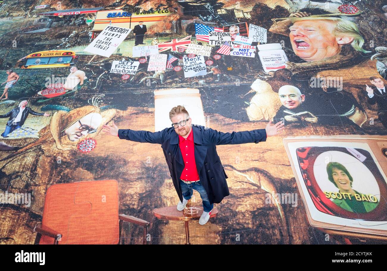 Artist Cold War Steve with a jigsaw of his art work, Trumpscape ...