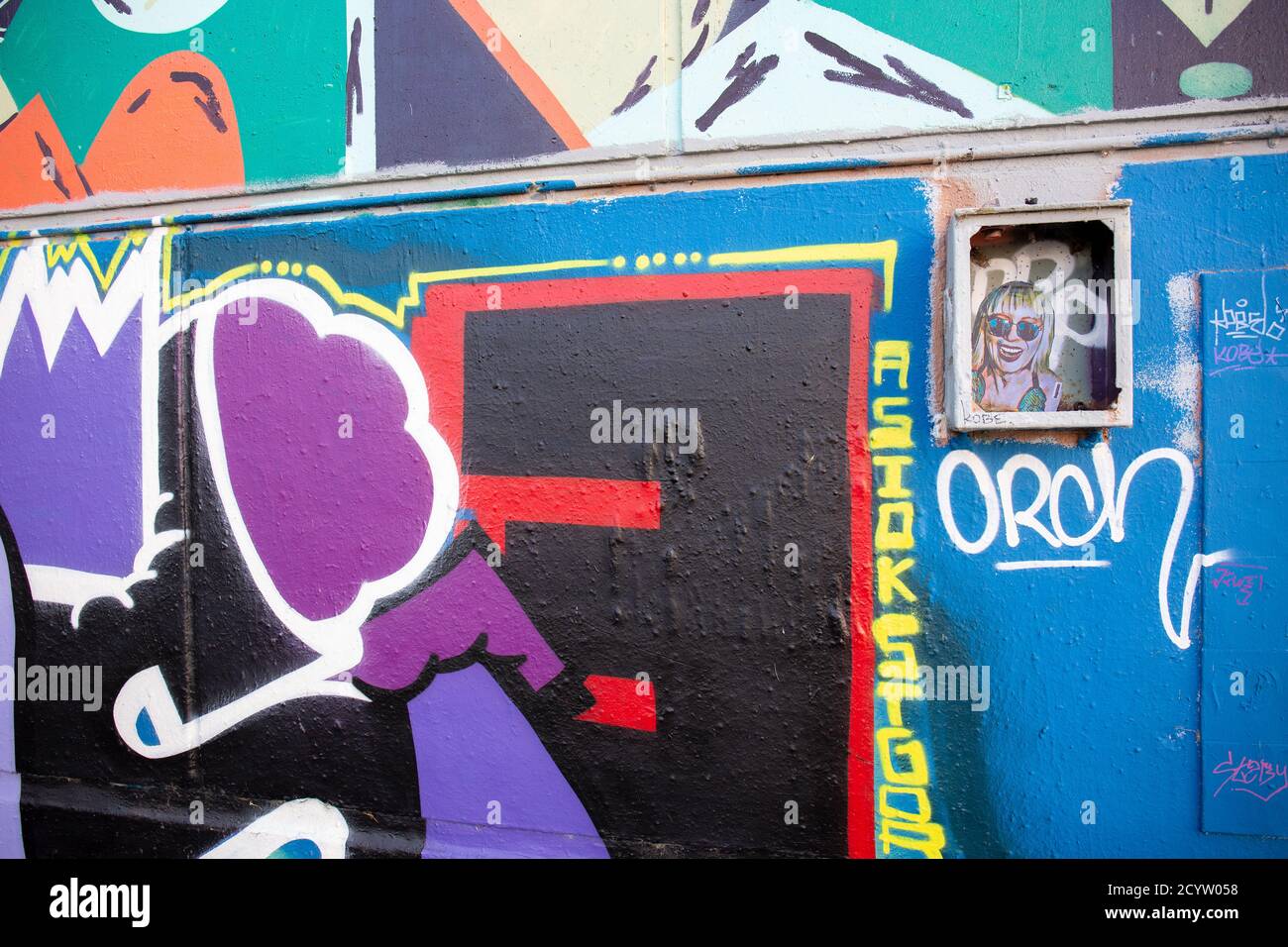 Graffiti street art tag on a wall Stock Photo - Alamy