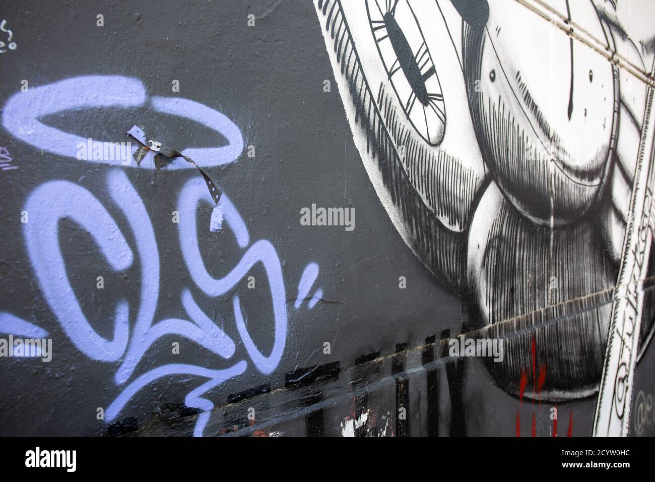 Graffiti street art tag on a wall Stock Photo - Alamy