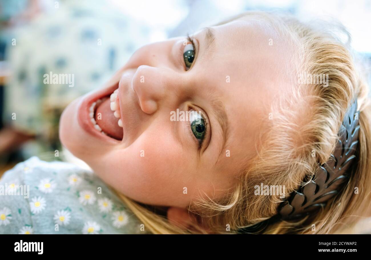 Closeup of girl looking back Stock Photo - Alamy