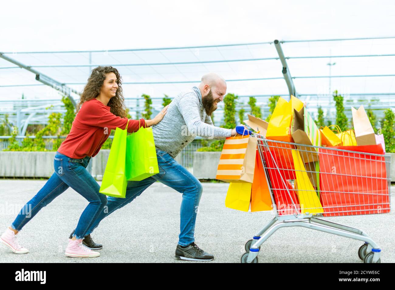 Black man pushing cart full hi-res stock photography and images - Alamy