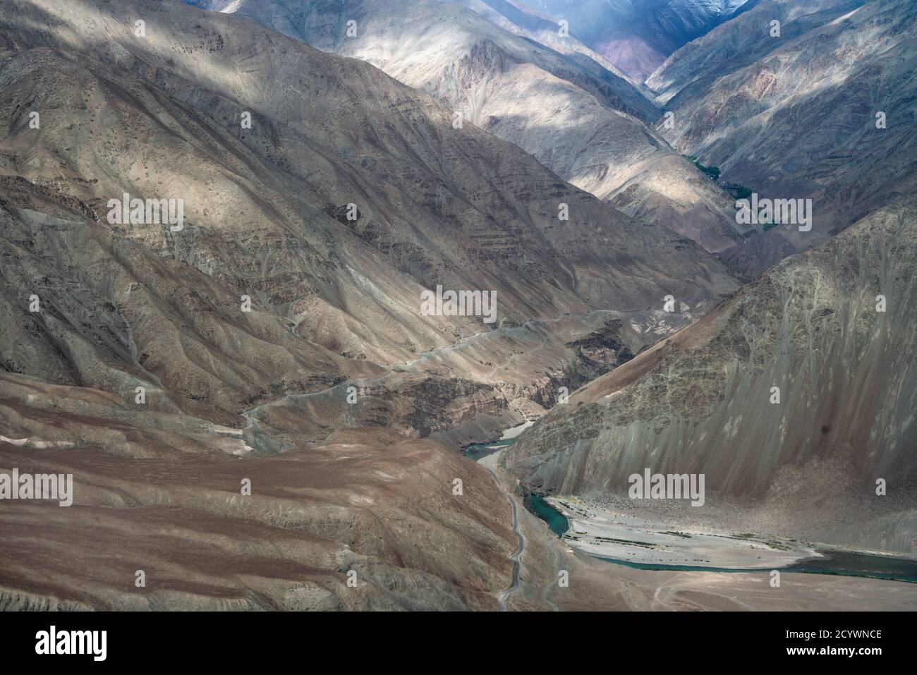 Sunset in a huge mountain gorge, aerial shot, Ladakh, Himalayas, North ...