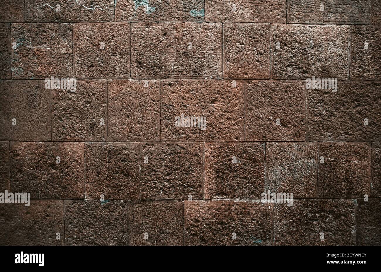 Dark porous brick. Background image. Ancient brick stone wall. High ...