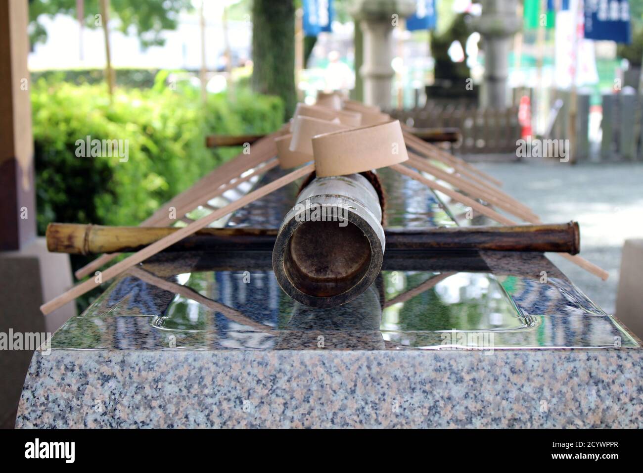 The basin or chozubachi and dippers used in ritual entering Shinto ...