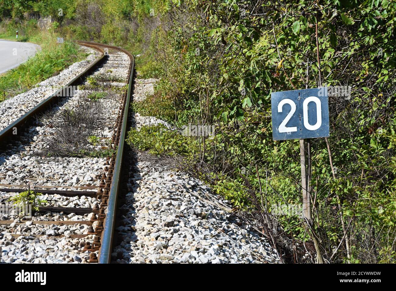 Rail road sign that warns locomotive drivers that maximum speed is 20 ...