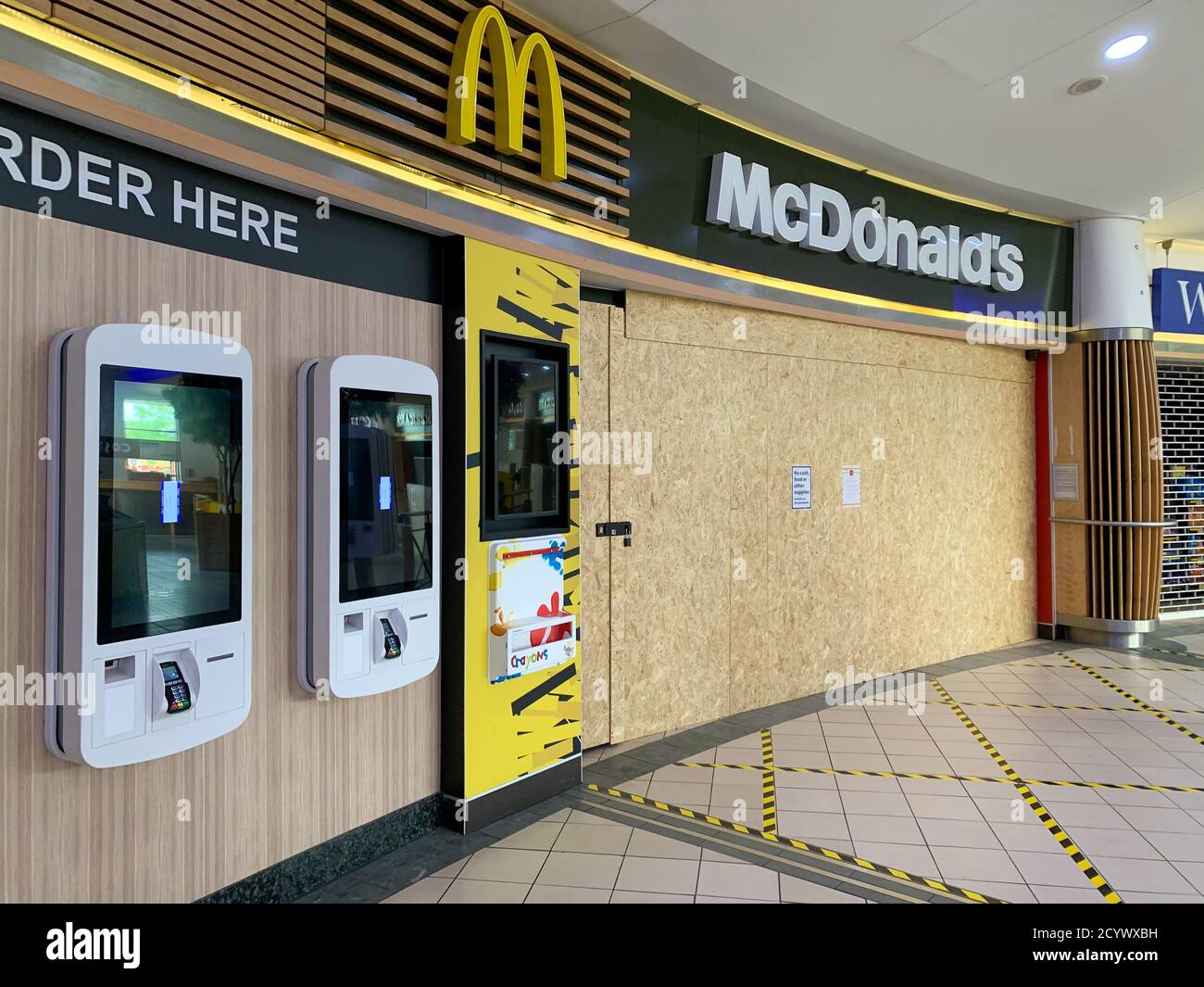 Boardered up McDonald’s during Covid crisis at Cambridge services Stock ...