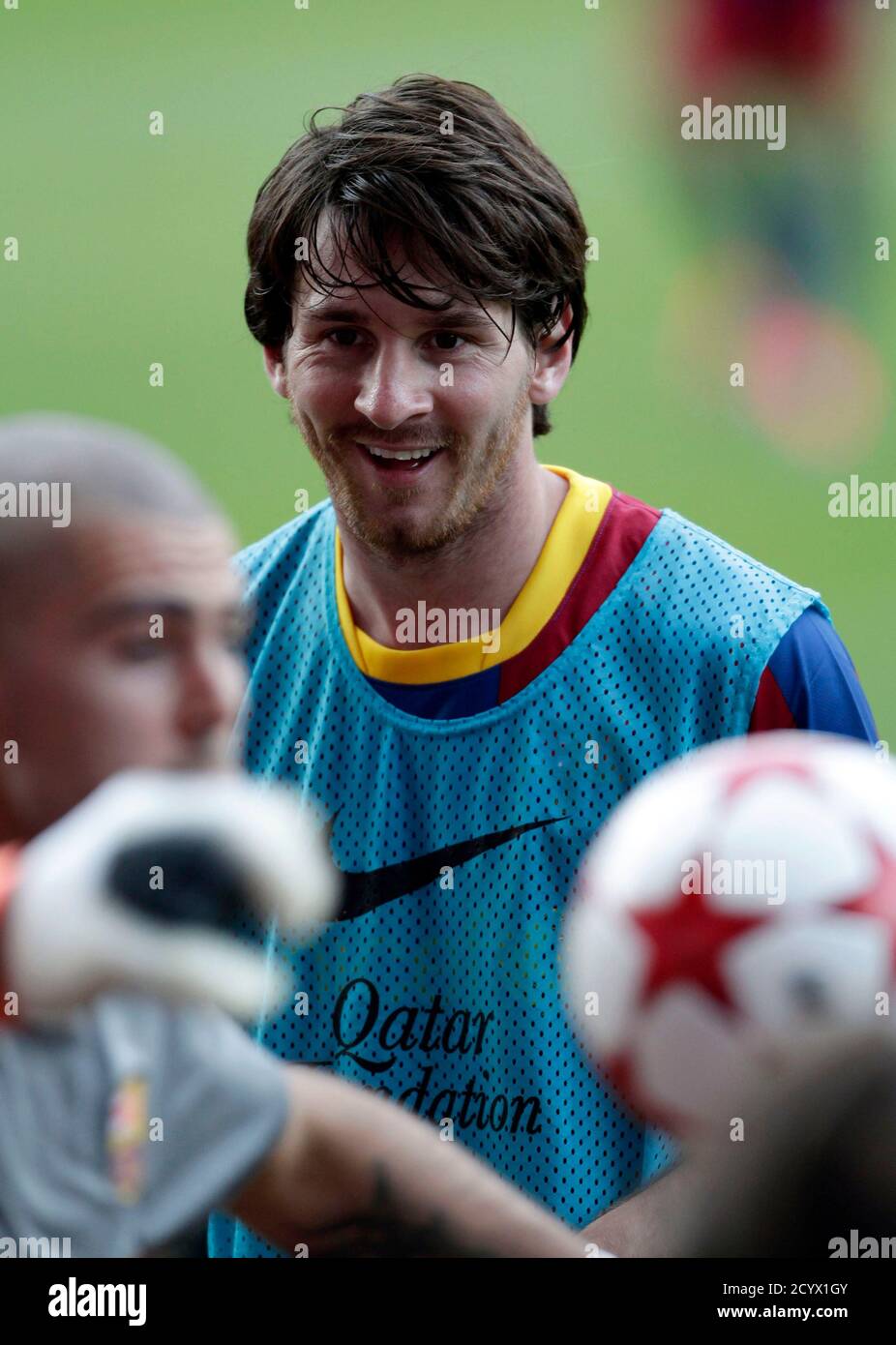 Barcelonas lionel messi attends training hi-res stock photography and ...