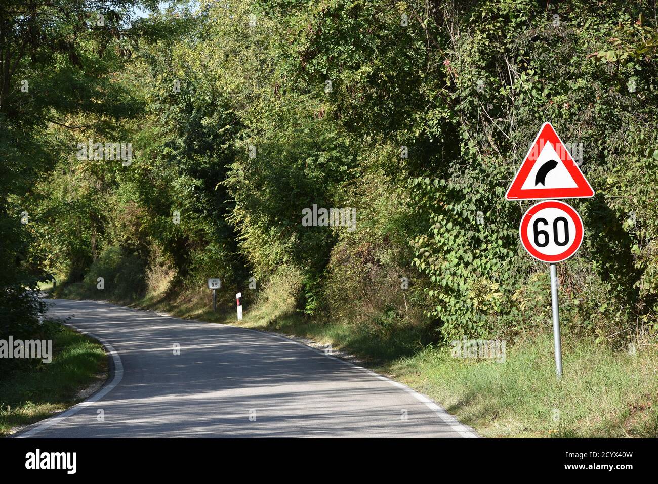 Road signs that shows maximum speed of 60 kilometers per hour and signa ...