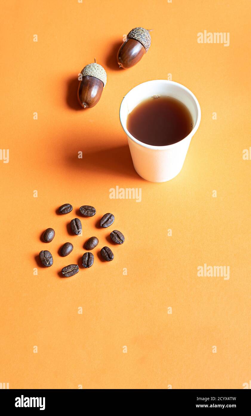 Cardboard cup of eco-friendly material with acorn coffee, acorns and ...