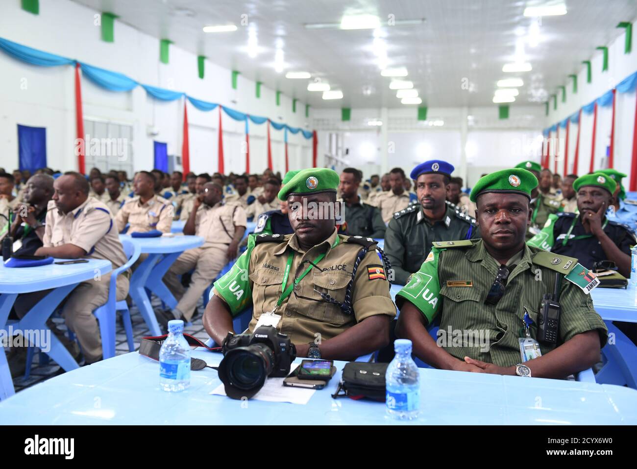 Police officers from the African Union Mission in Somalia (AMISOM) and ...
