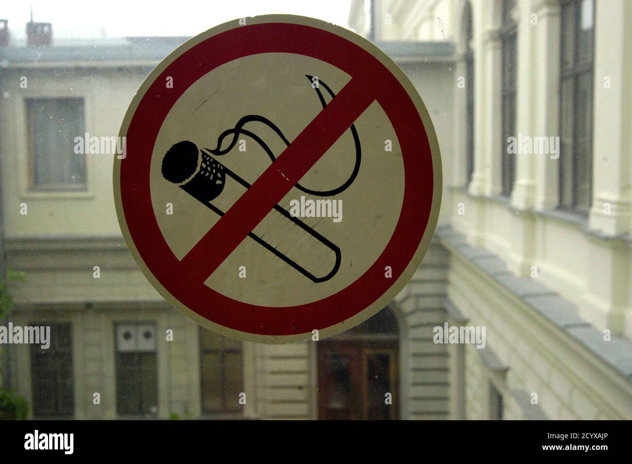 smoking ban or smoking prohibited sign with pictogram of a filter ...