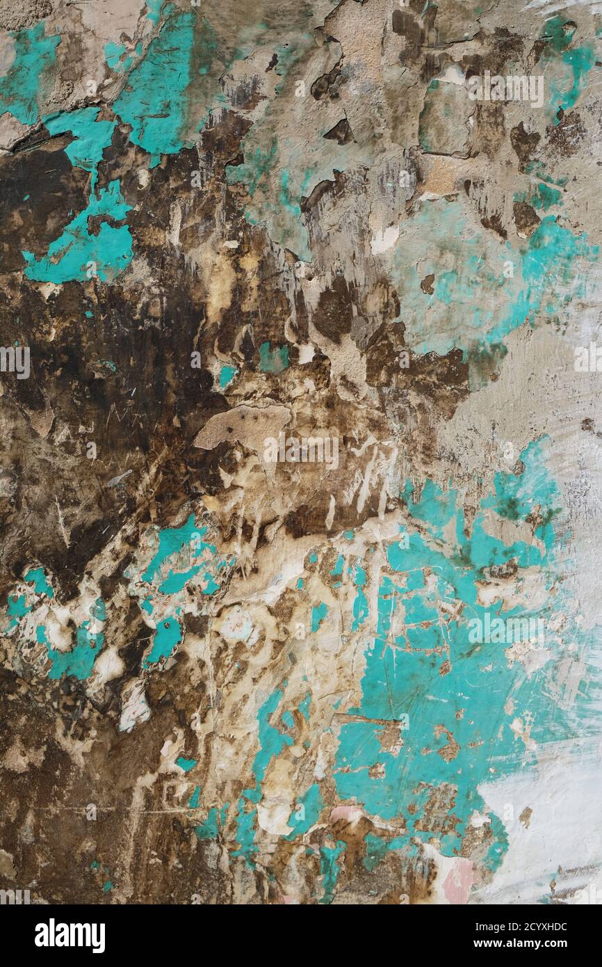 Painted and weathered tail wall with light and brown parts Stock Photo ...