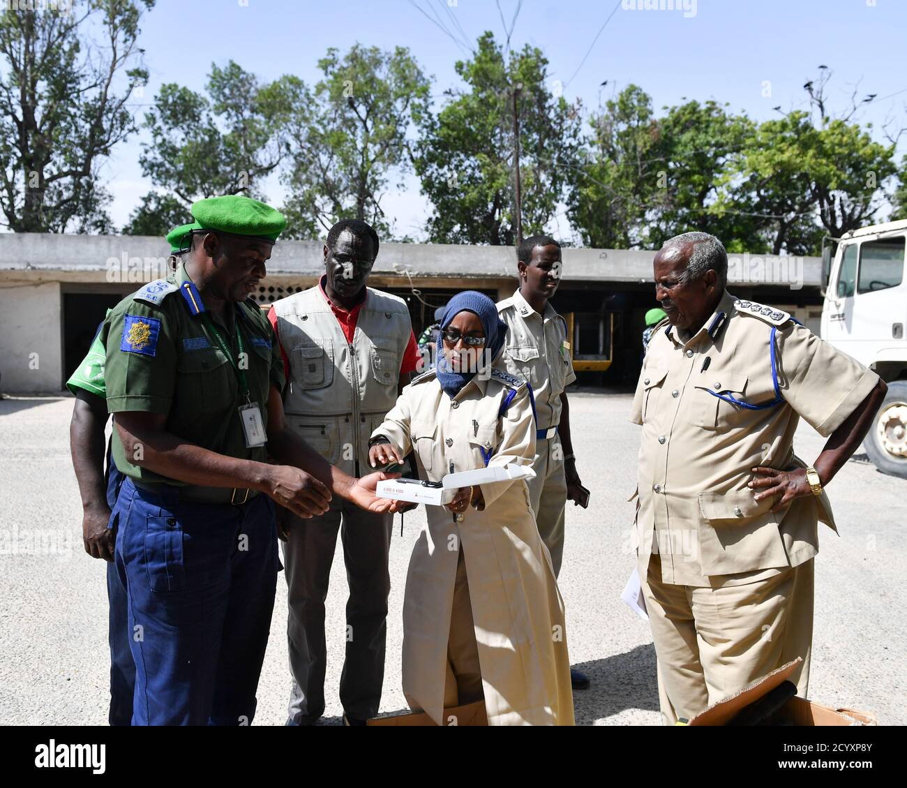 Police officers serving under the African Union Mission in Somalia ...