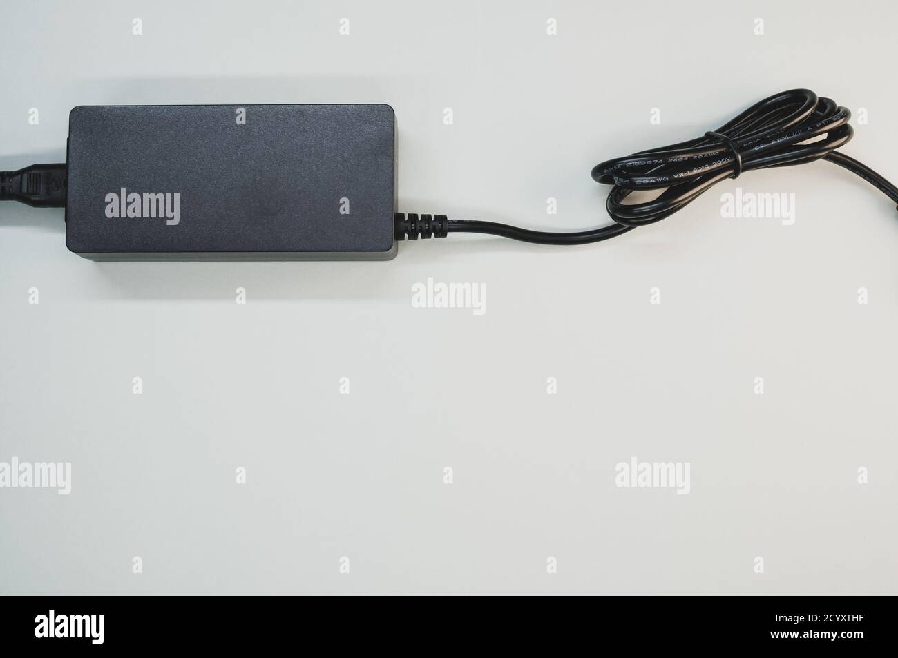 Top view of a laptop charger isolated on a gray background Stock Photo ...