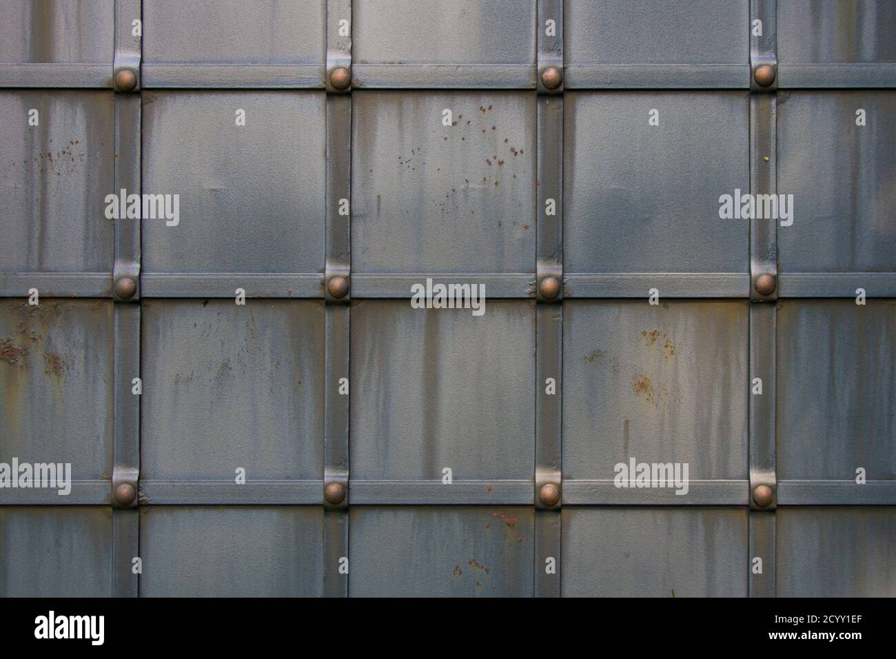 Grunge gray metal texture background with rivets Stock Photo - Alamy