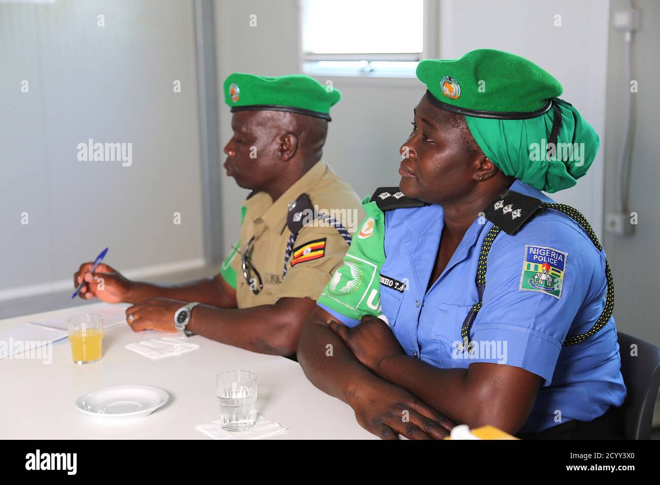 Police officers serving under the African Union Mission in Somalia ...