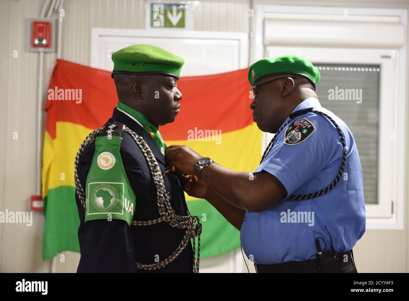 On March 26, 2019, AMISOM Police Chief Rex Dundun presented a medal to ...