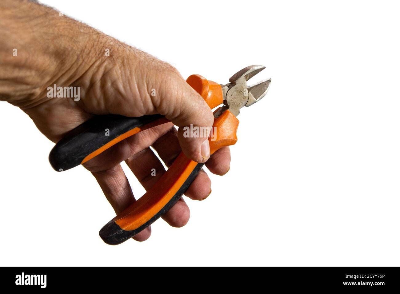 Hand holding wire cutters isolated against white background Stock Photo ...