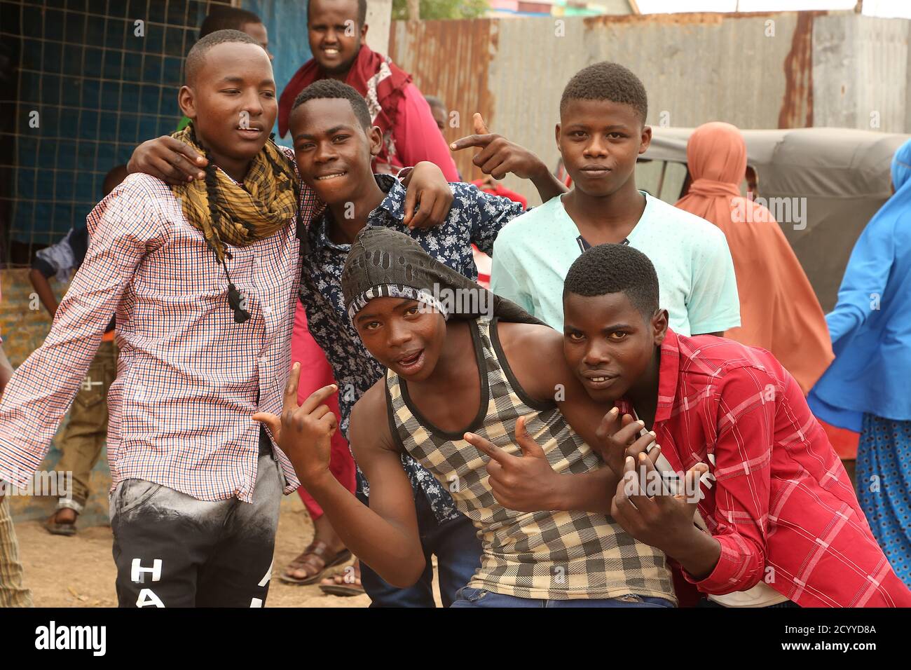 Young people pose for a group photo in Jowhar, Hirshabelle State ...