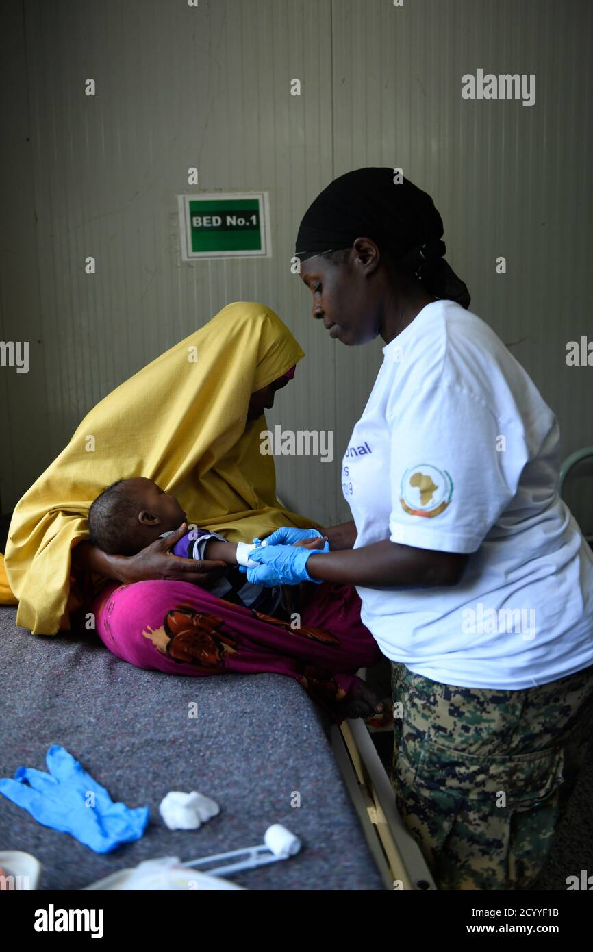 On June 14, 2019, a Ugandan soldier serving with the African Union ...