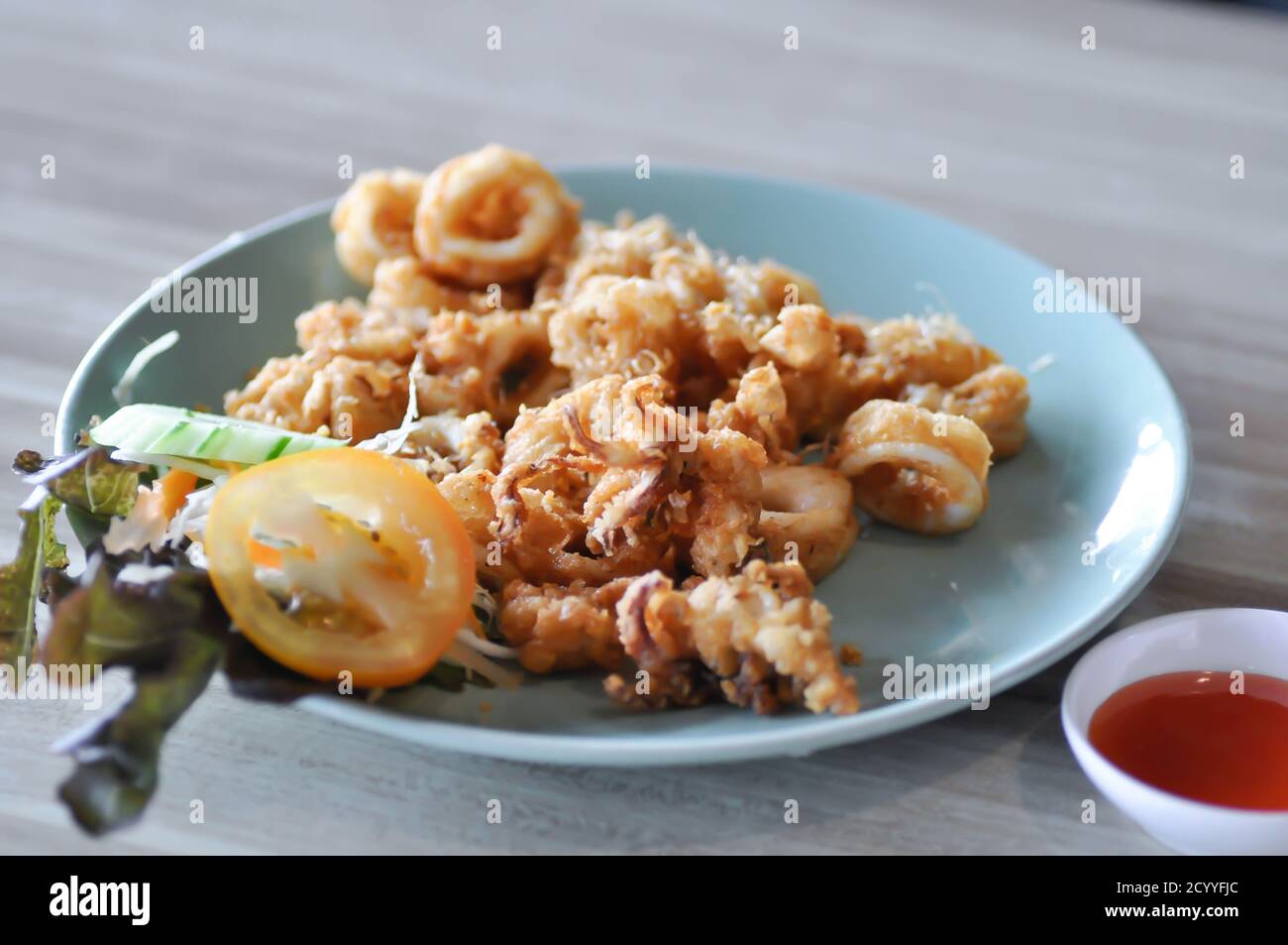 calamari or fried squid and sauce Stock Photo - Alamy