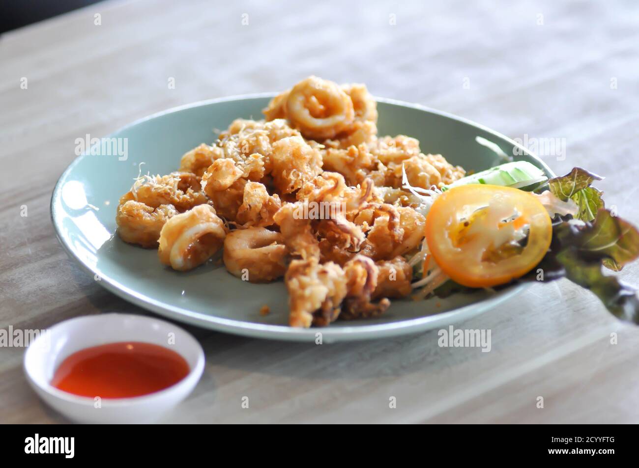 calamari or fried squid and sauce Stock Photo - Alamy
