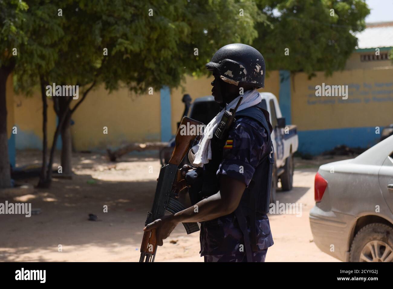 A Ugandan Formed Police Unit officer, part of AMISOM, stands on guard duty in Mogadishu, Somalia ...