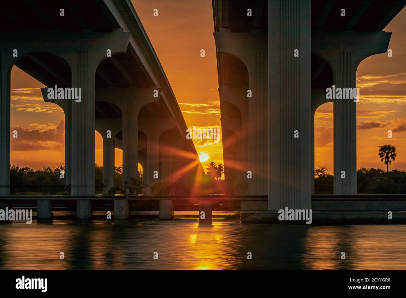 sunrise between bridges Stock Photo - Alamy