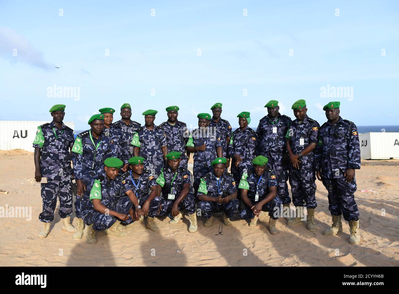 Officers from the AMISOM Uganda Formed Police Unit 7 (FPU-7) contingent ...