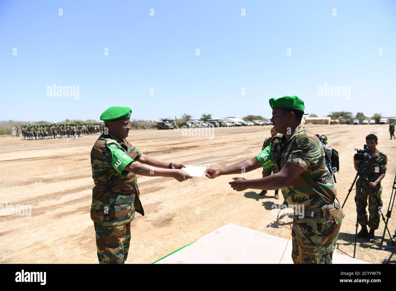 Brig. Gen. Alemu Ayene, the incoming Sector Three Commander, presents a ...