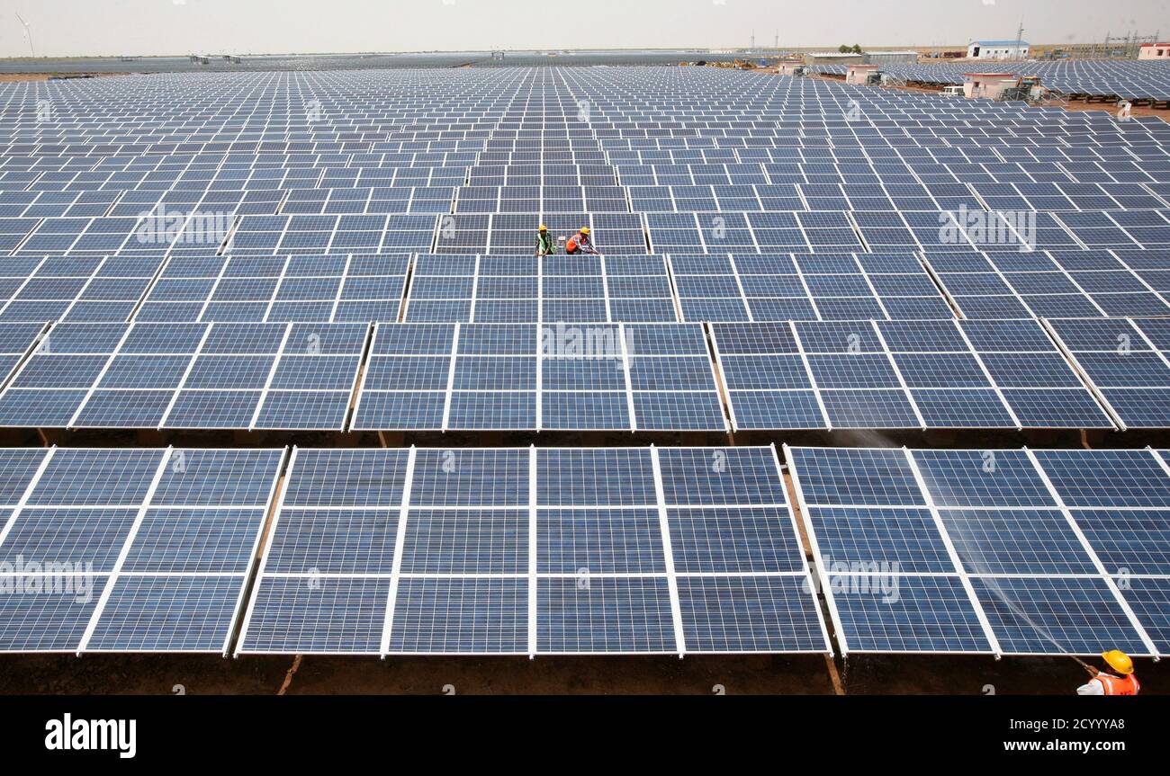 Construction workers install photovoltaic solar hi-res stock ...