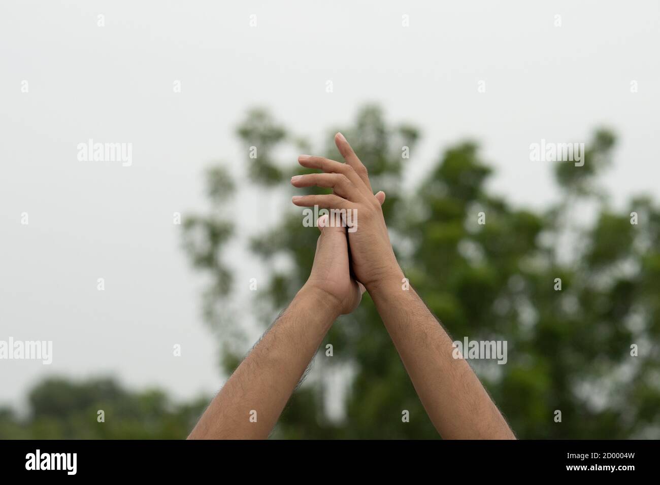 male hand gesture and signs on outdoor background Stock Photo - Alamy