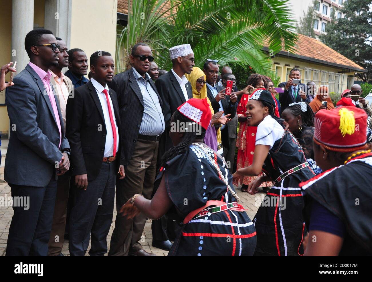 Traditional dancers entertain members of Parliament from the ...