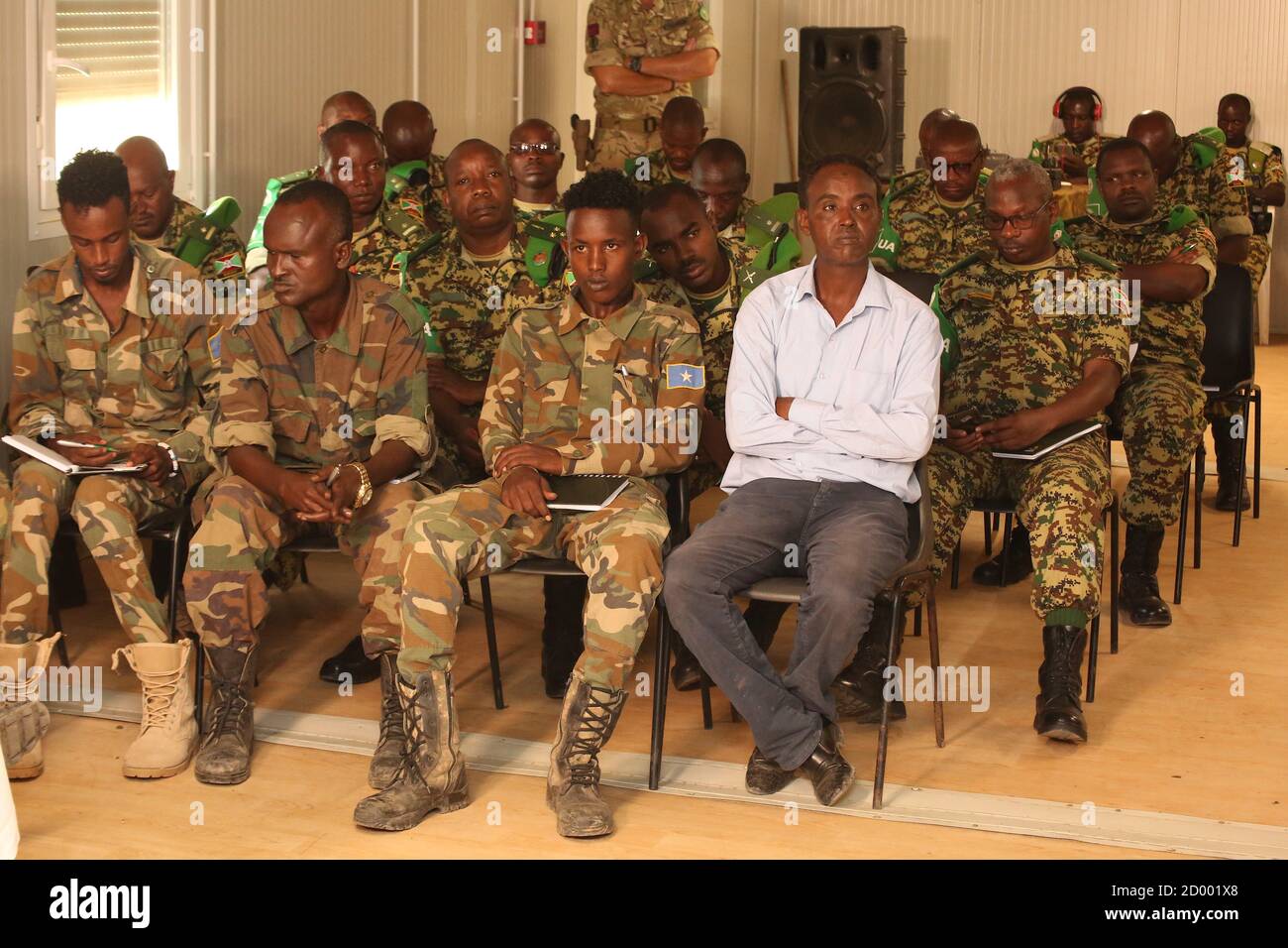 Military officers from the African Union Mission in Somalia (AMIOM) and ...