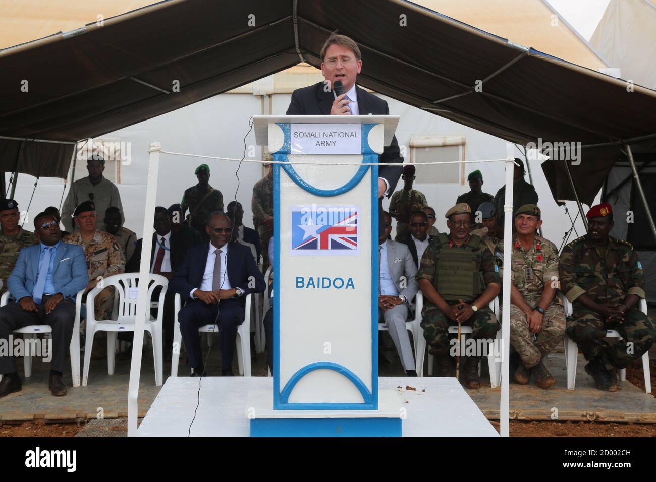 Ben Fender, The British Ambassador to Somalia, speaks during a pass-out ...