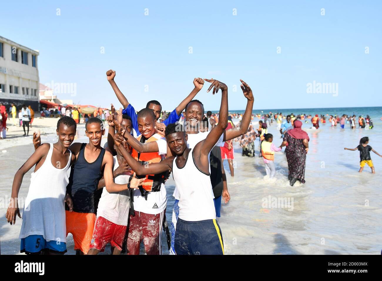 Young boys pose for a photo at the Lido beach in Mogadishu, Somalia on ...