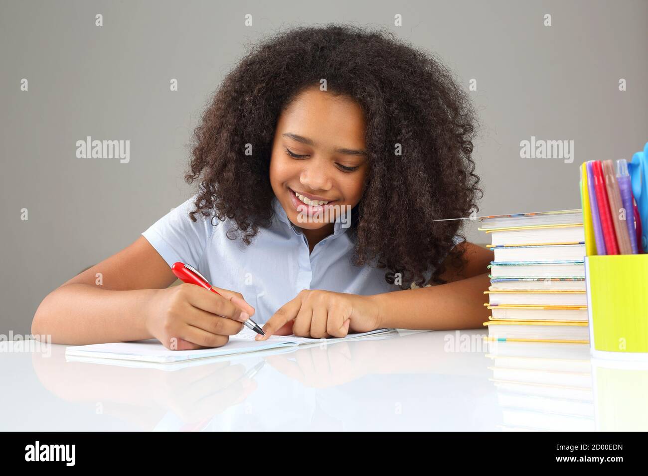 Child doing activity in classroom hi-res stock photography and images ...