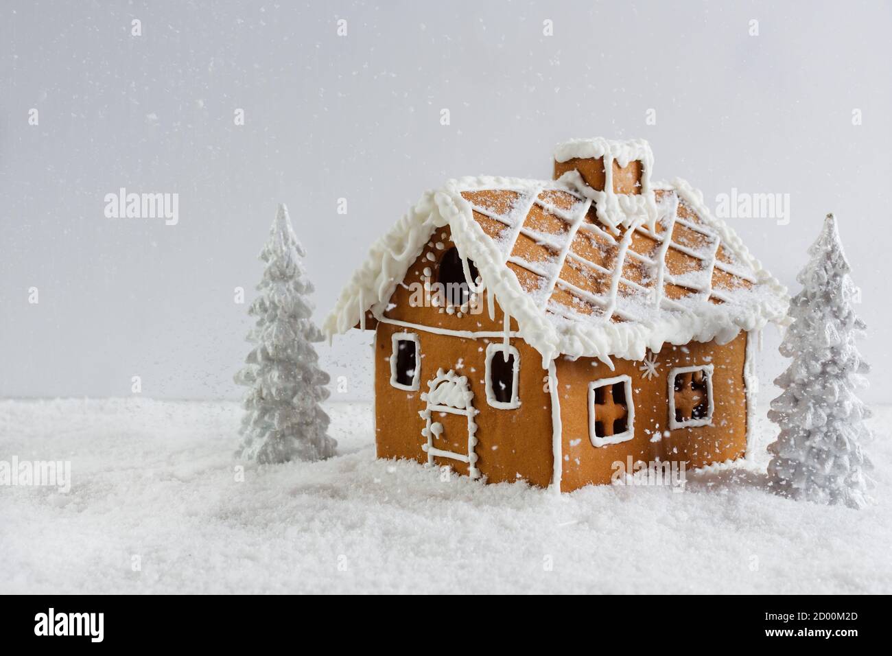 Creative winter composition with handmade gingerbread house. Beautiful ...
