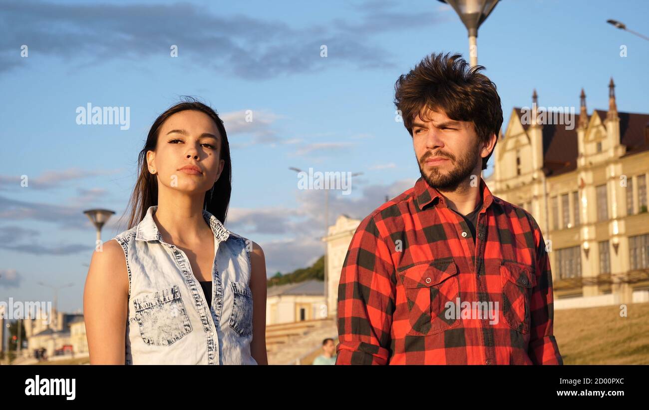 Angry and sad silent couple walking being mad at eachother Stock Photo ...