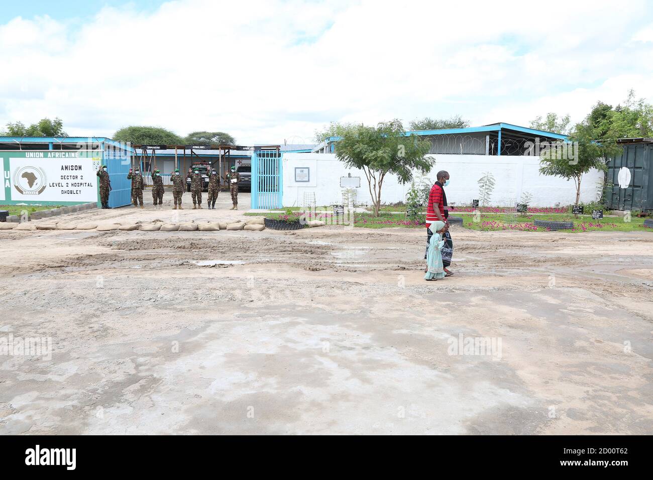 In Dhobley, Somalia, AMISOM soldiers from the Kenya Defence Forces bid ...
