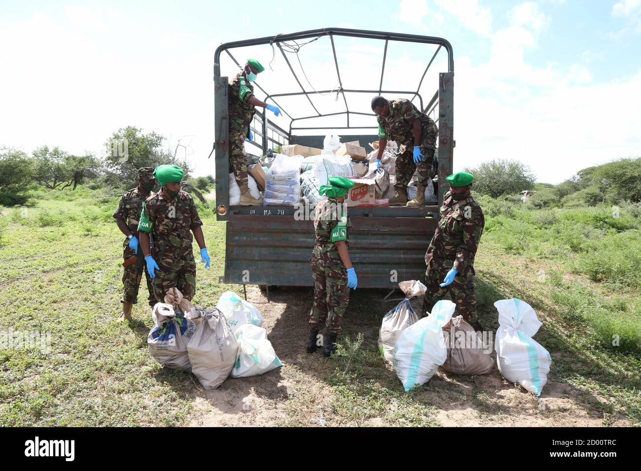 On May 20, 2020, Kenyan soldiers serving with AMISOM distributed food ...
