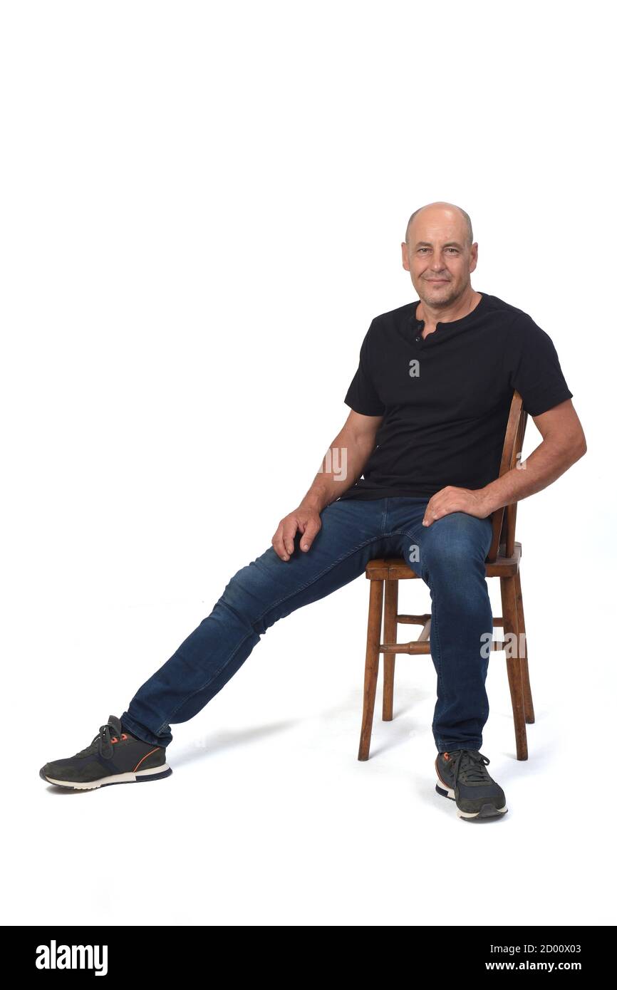 bald man sitting and relaxing on white background Stock Photo - Alamy