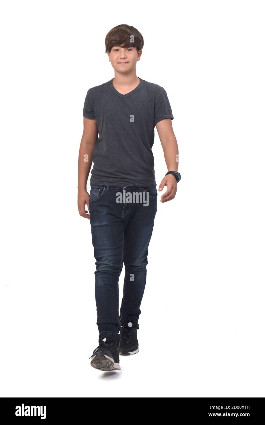 portrait of a teenage boy front view walking on white background Stock ...