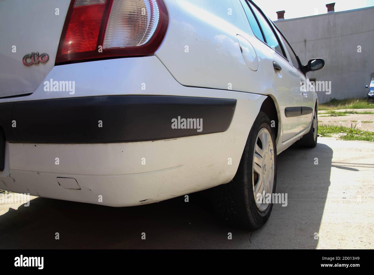 Back of a damaged car old car in parking lot Stock Photo - Alamy