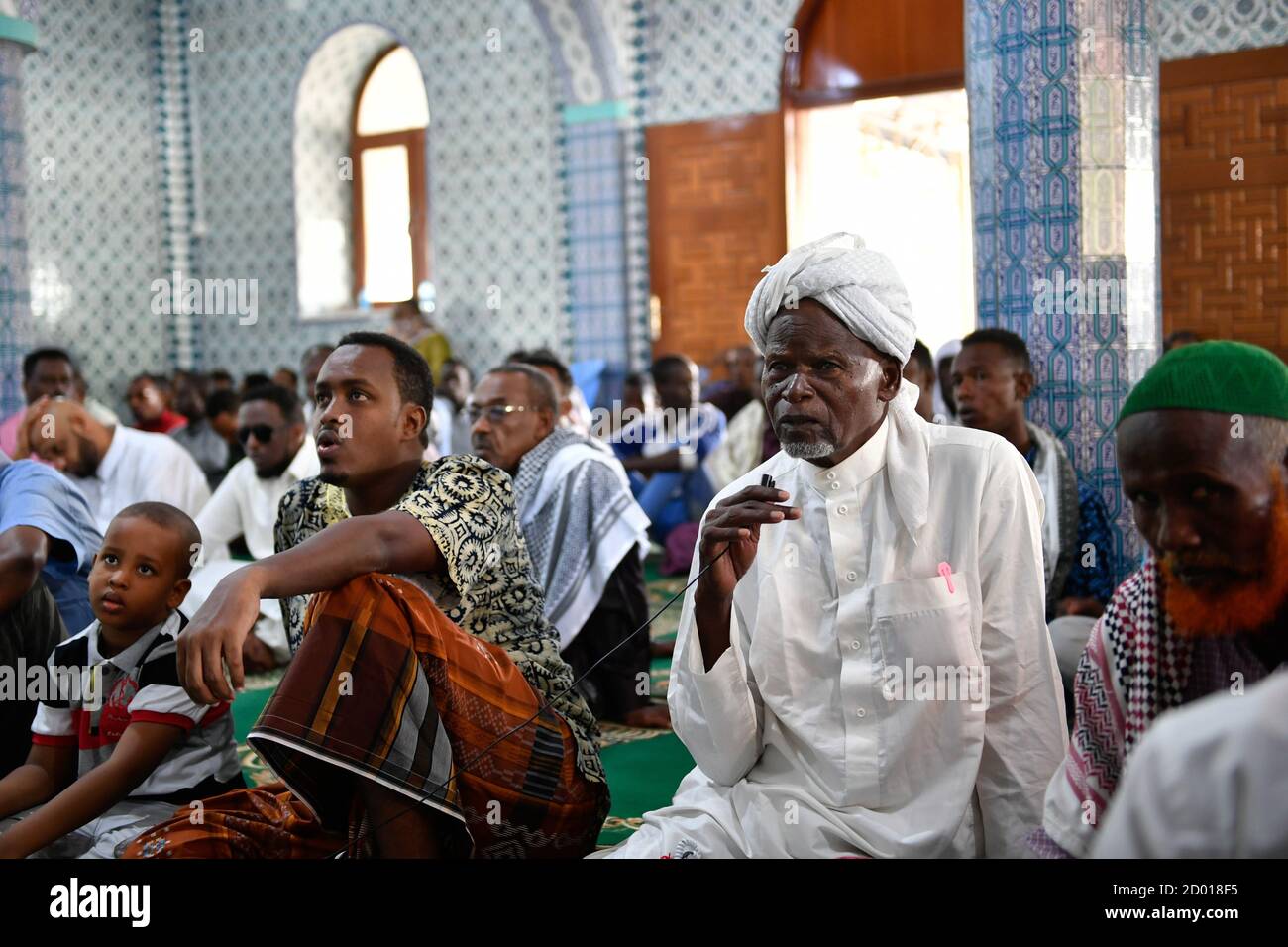 On May 23, 2020, a cleric leads prayers at the Arbaca Rukun mosque in ...