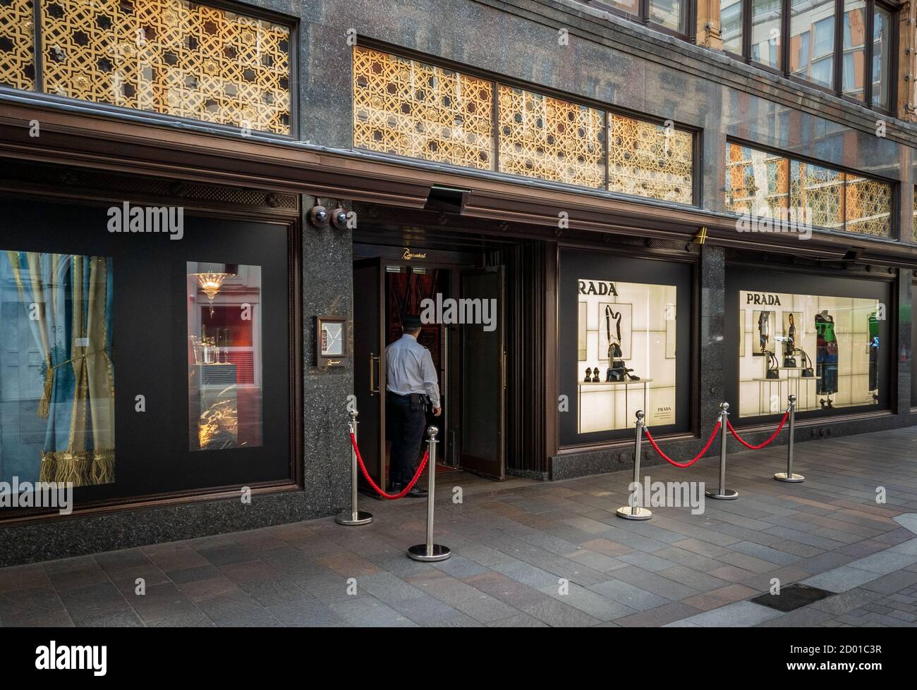 An exterior side view of Harrods department store showing shop window ...