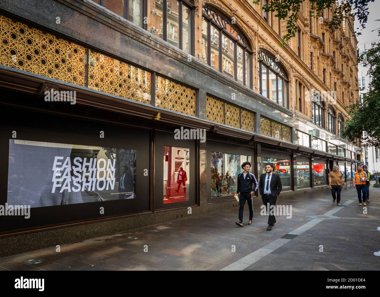 An exterior side view of Harrods department store showing shop window ...
