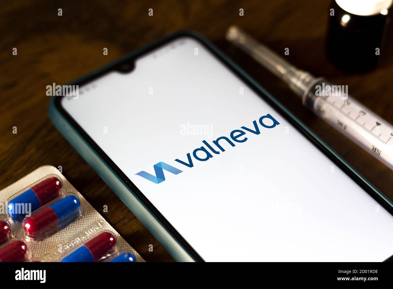 In this photo illustration the Valneva SE logo seen displayed on a ...