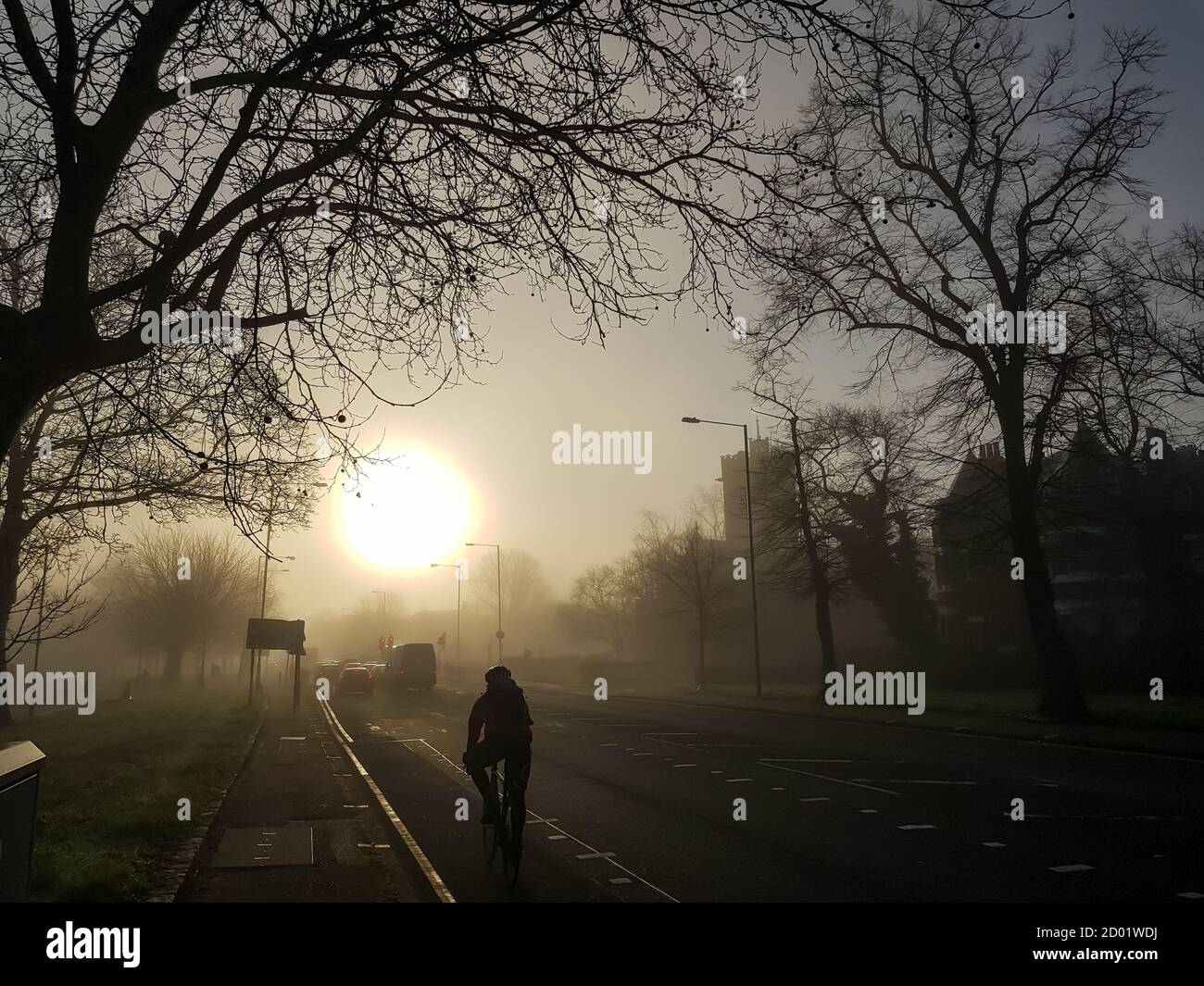 Commuting on a misty foggy morning in London Stock Photo - Alamy