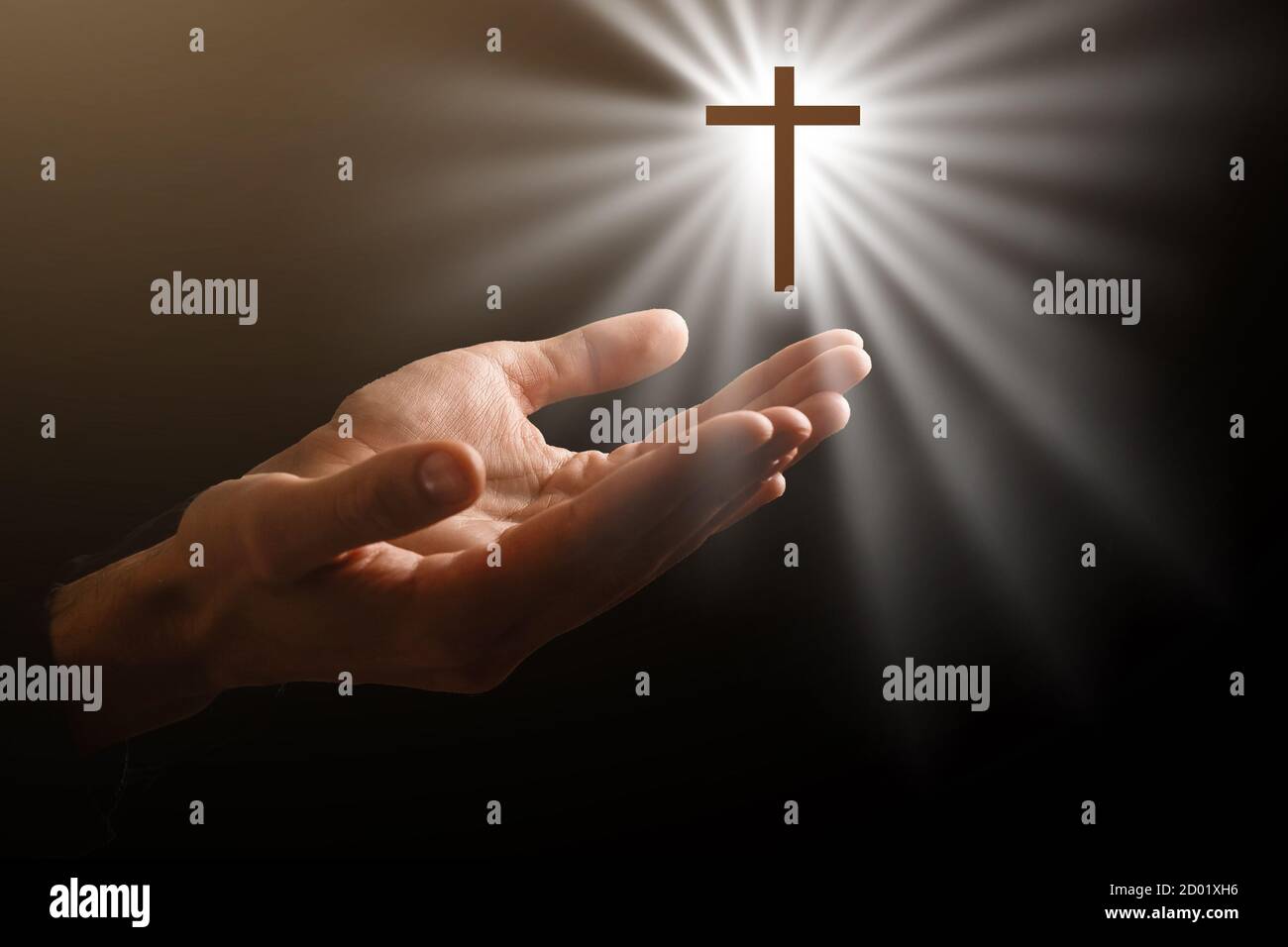 Light in the human hands in the dark Stock Photo - Alamy